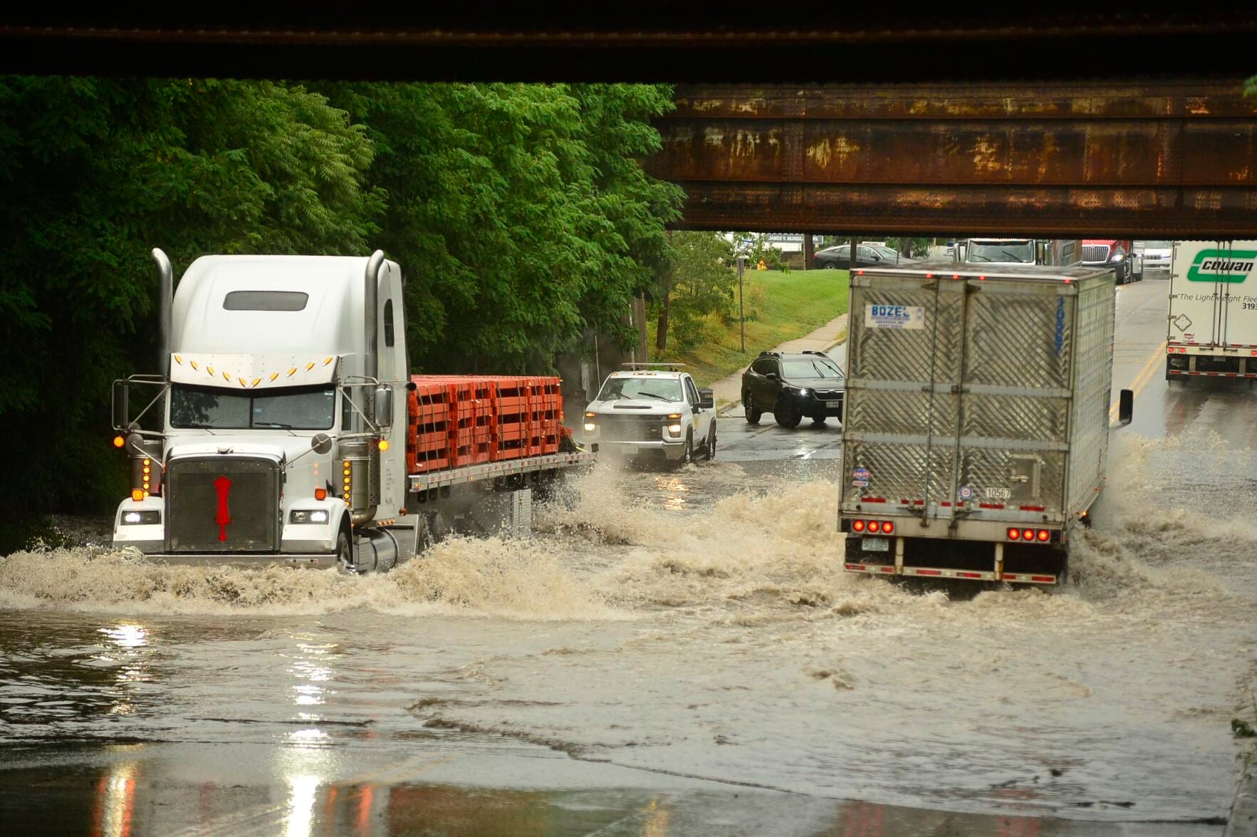WATCH: City firefighters rescue woman stranded in Cedar Street flooding ...