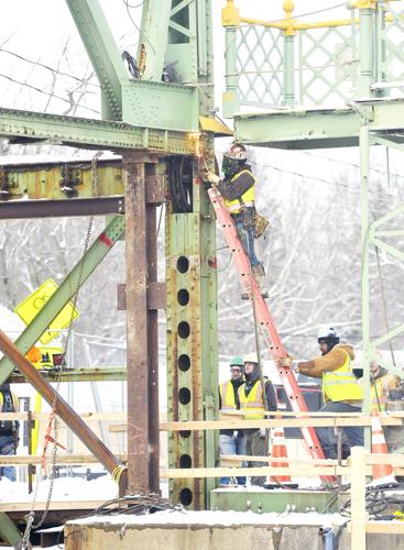 WATCH: And away it goes ... Crews disassemble Albion lift bridge | Top ...
