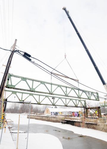 WATCH: And away it goes ... Crews disassemble Albion lift bridge | Top ...