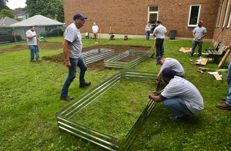 (WATCH) Lending a green thumb: National Grid volunteers help Salvation ...