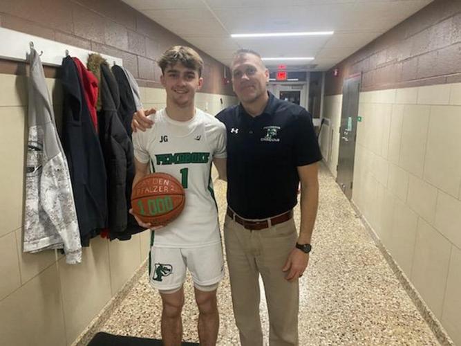 H.S. BOYS BASKETBALL: Pembroke’s Pfalzer slams his way into history ...