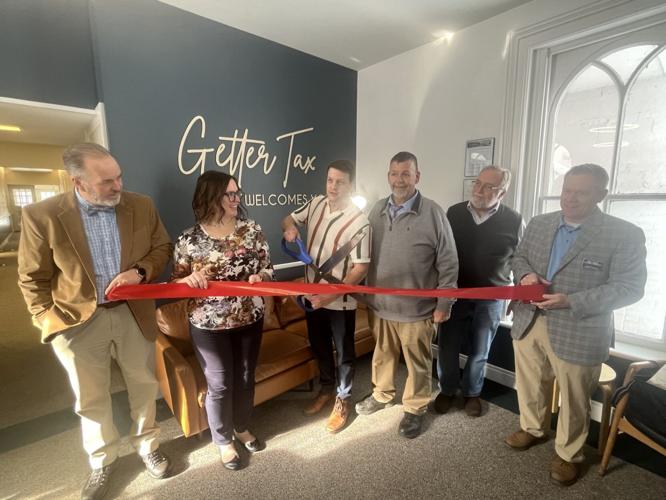 Tax business ribbon-cutting | Economics | thedailynewsonline.com