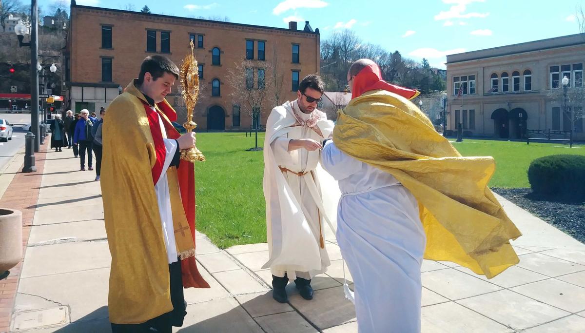 Catholic priests lead walk with Blessed Sacrament | Free | thederrick.com