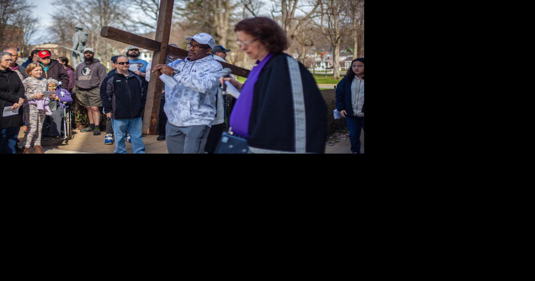 Faithful gather for Good Friday cross walk | Front Page | thederrick.com