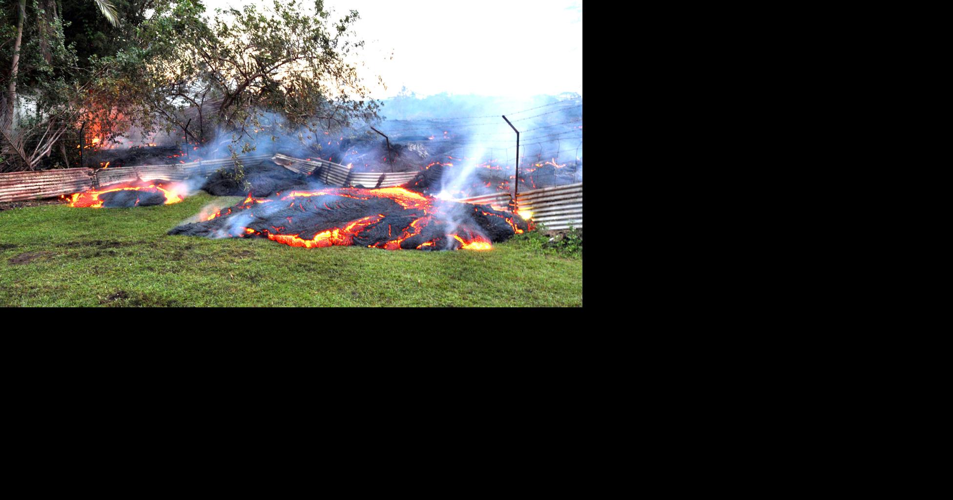 Stream of slow-moving lava sets home on fire in rural Hawaii town ...