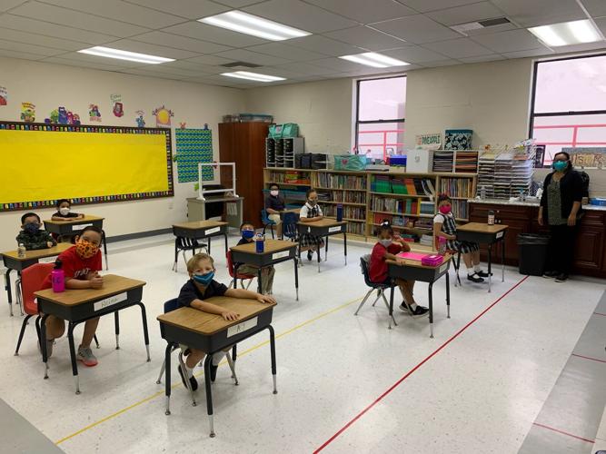Smaller north end schools resume classes on campus | Education ...