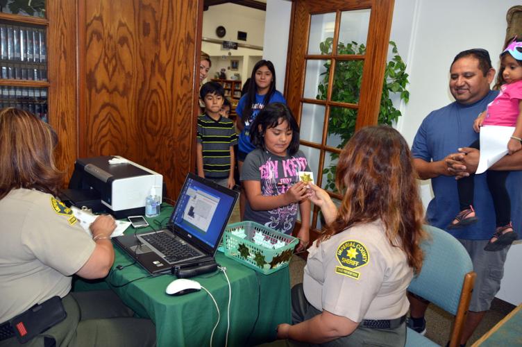 Dozens of kids entertained with stories and crafts at Brawley library’s ...