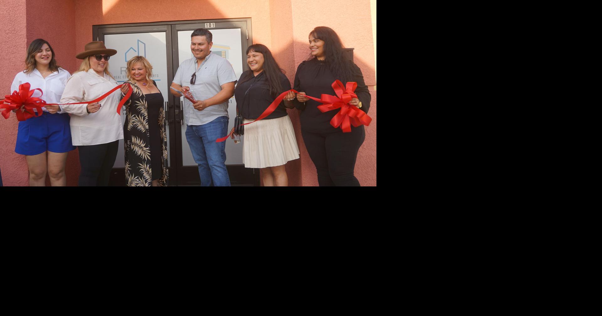 Andrade Construction and Real Estate Team Experts hold ribbon cutting ...
