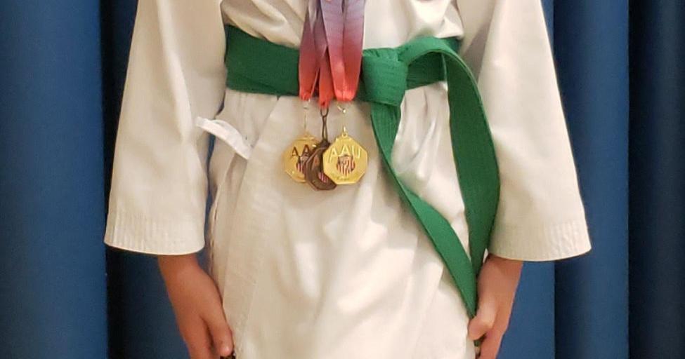 Ethan Rowe wins two golds, one bronze | Sports | thedigitalcourier.com