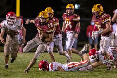 Fun In The Mud: Cardinals Power Past St. Henry | Sports ...