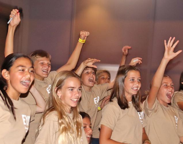 Middle school students unite to praise, adore Eucharist | Venice ...