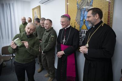 Under Russian missiles, U.S. military archbishop visits Ukraine's ...