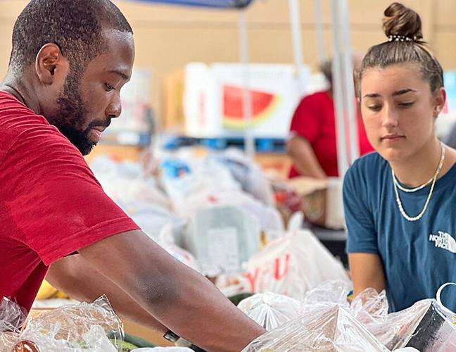 Catholic Charities’ food pantries surpass milestone in feeding those in ...