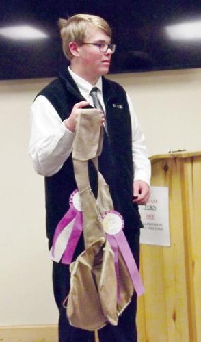 Commissioners enjoyed 4-H presentations on hunting articles and cake ...