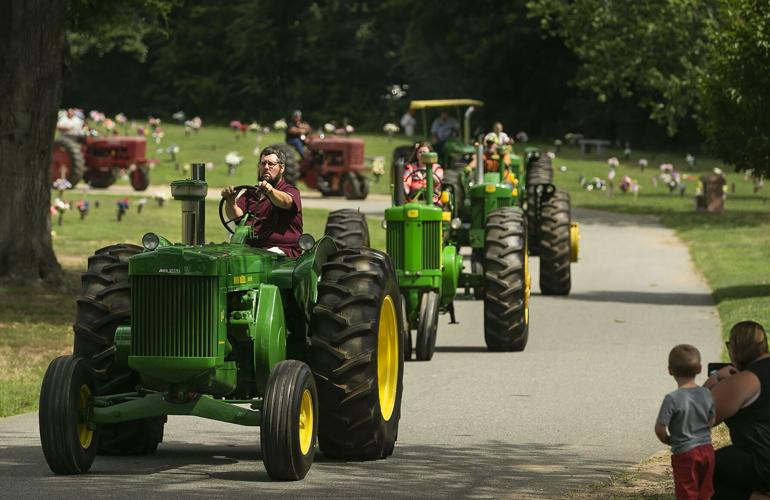 14 antique tractors take part in Virginia funeral procession