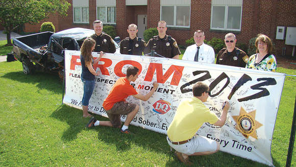 High school students sign safe PROM pledge