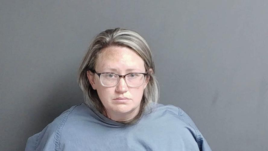 Henry couple charged with embezzling from youth organization