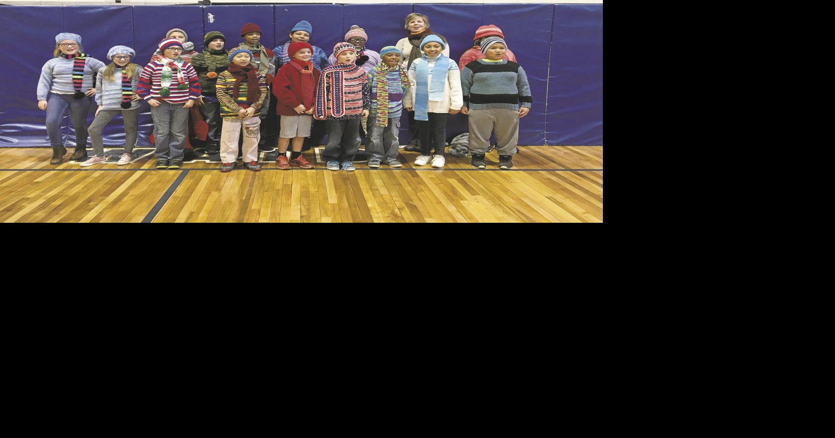 Lee M. Waid students receive free winter sweaters