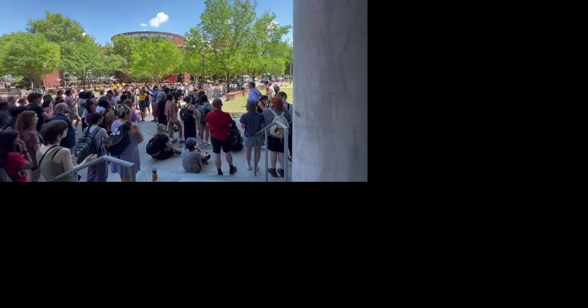 Protesters chant outside the VCU library