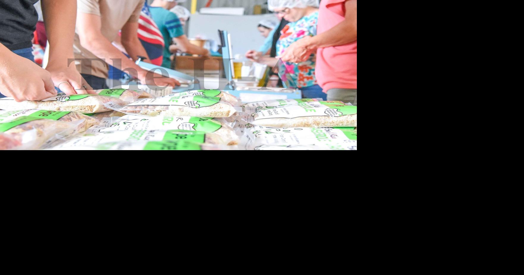Volunteers Prep Food For Meals Of Hope | News | theheraldadvocate.com