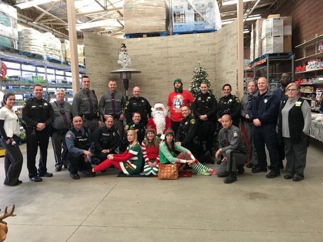 Shop With a Cop: Local officers team with Walmart to bring holiday ...