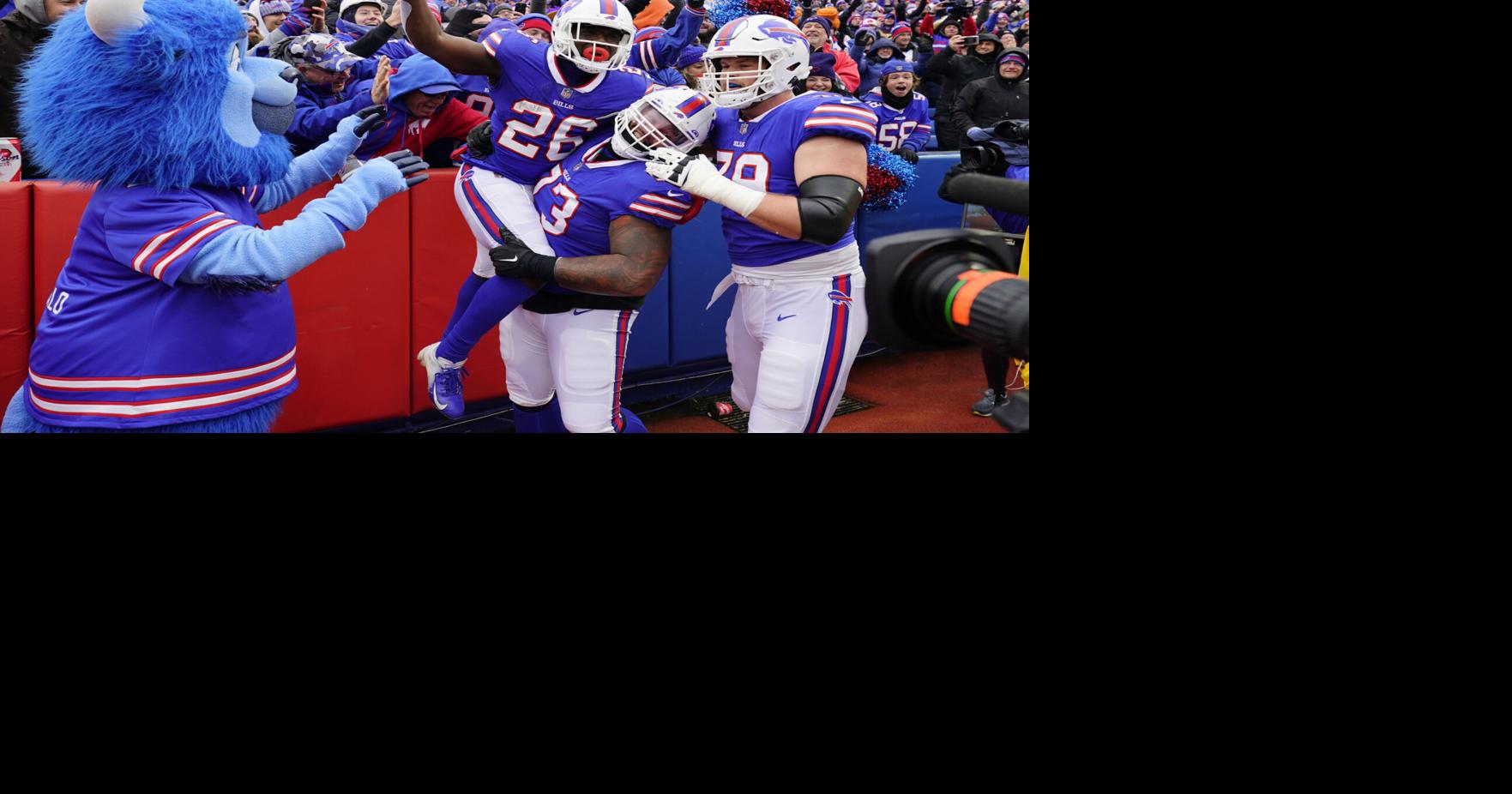 FOOTBALL FAMILY: Bills players, coaches lean on each other while away ...