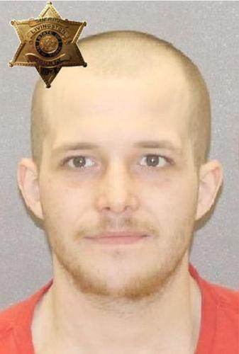 Jail inmate facing new felony after punching, cracking cell door window ...