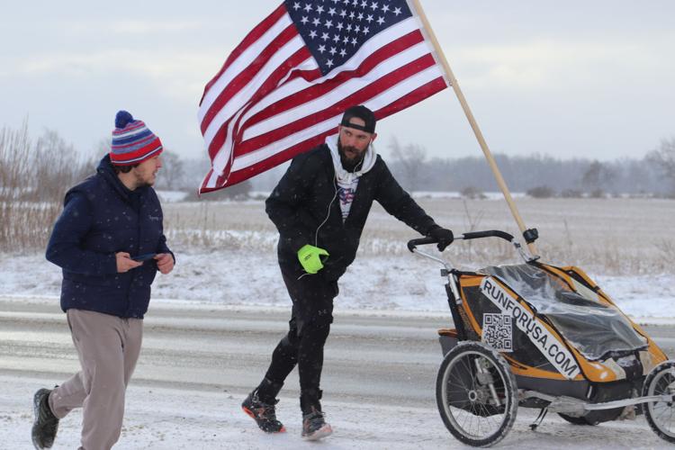 WATCH: Neither wind nor snow can stop Noah Coughlan on 'Run for America ...