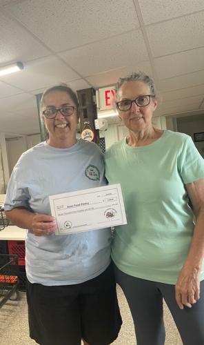 Puppy’s Bar & Grill raises $7,500 for Avon Food Pantry | News | thelcn.com