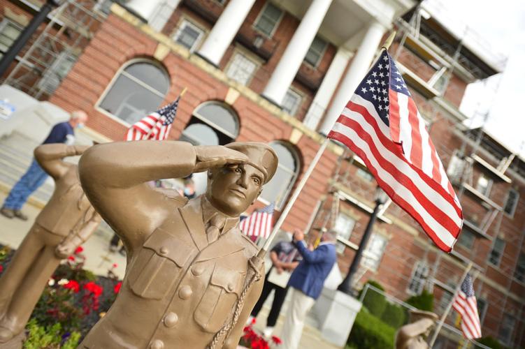 Clean-up give VA statues new life in Batavia | Local News | thelcn.com