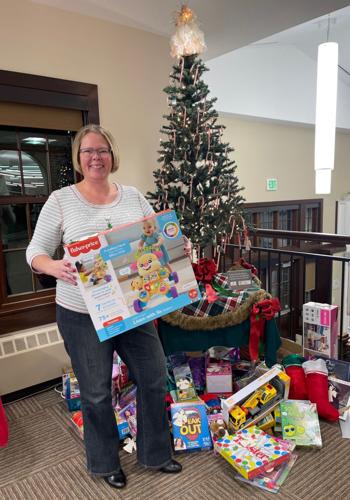 Livonia library, Rotary deliver winter needs and gifts | Local News ...