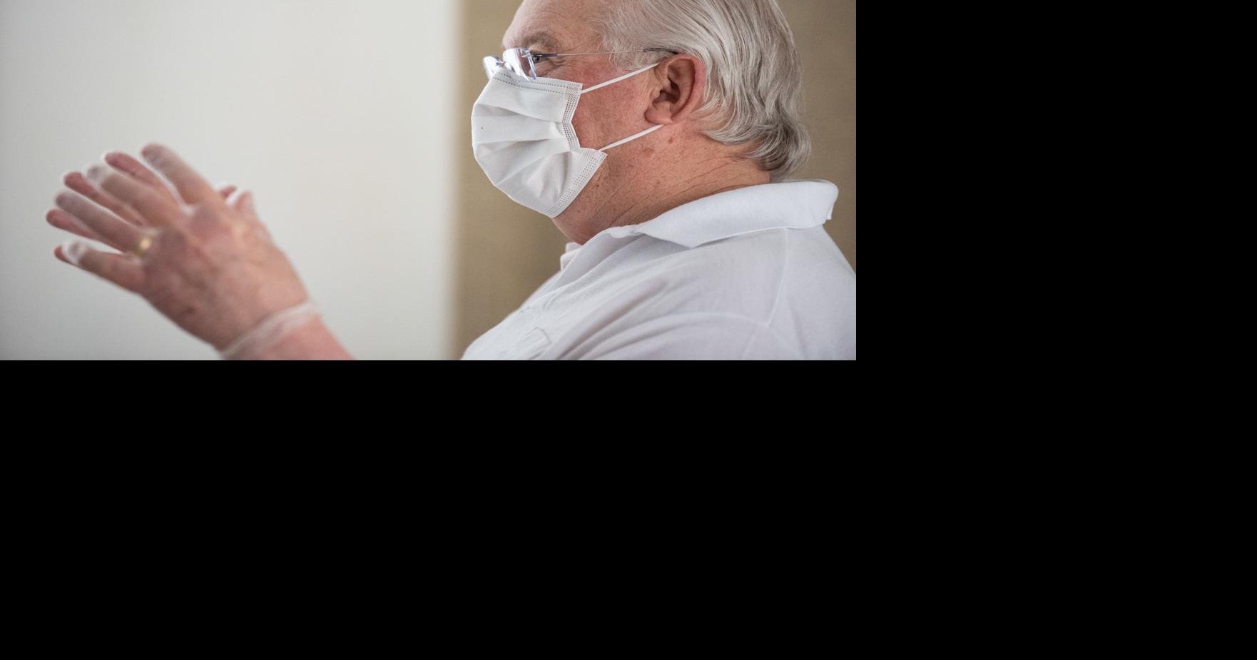 Steve Pfister asks Andrew Adams, a Riley County Emergency Preparedness Coordinator, questions ...