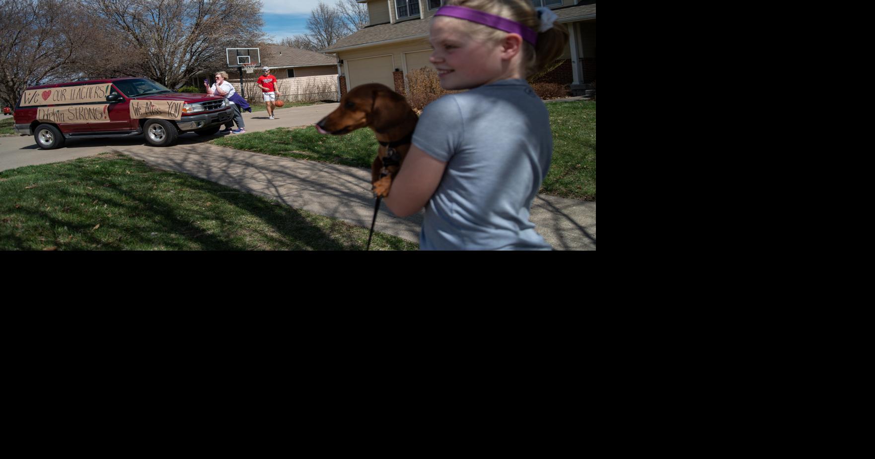 From right, Sutton Weixelman and her dog Raplhie, Peyton Weixelman and ...