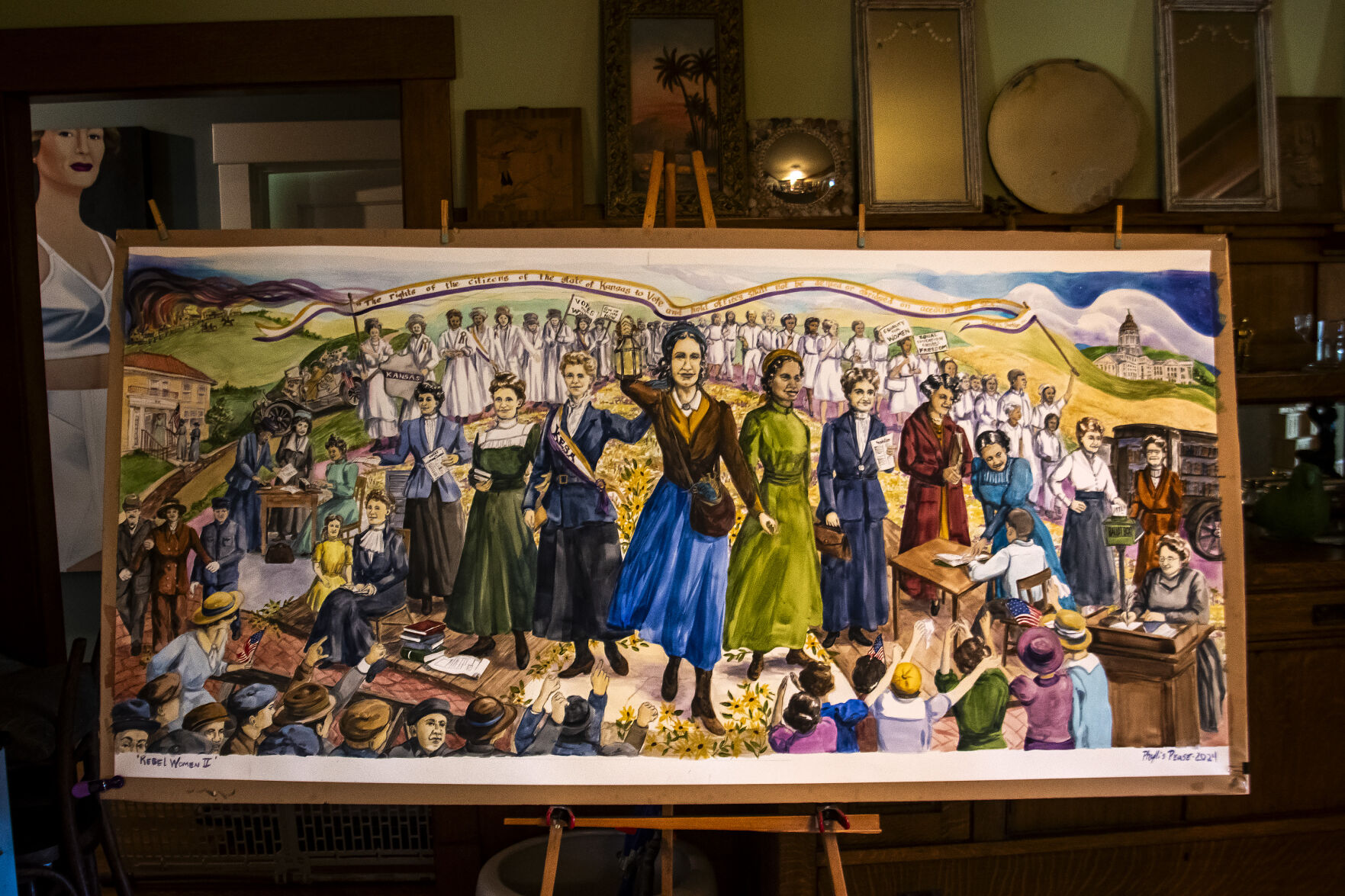 Local artist nears completion of suffragist mural for state capitol ...