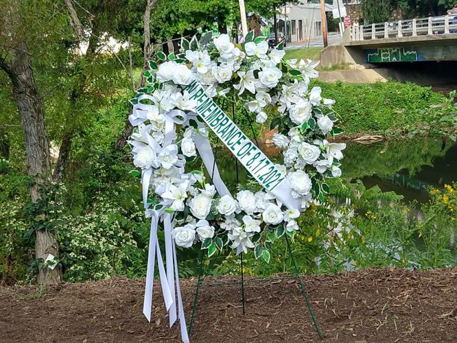 Wreath ceremony commemorates lives lost from last year's floods | News ...