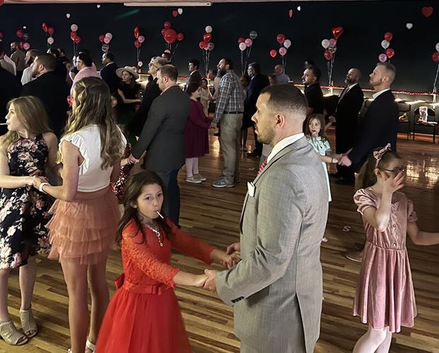 Father-daughter Valentine Dance raises money for school foundation ...