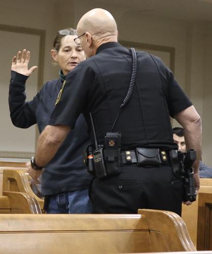 Woman escorted from county commissioners meeting by deputies | News ...