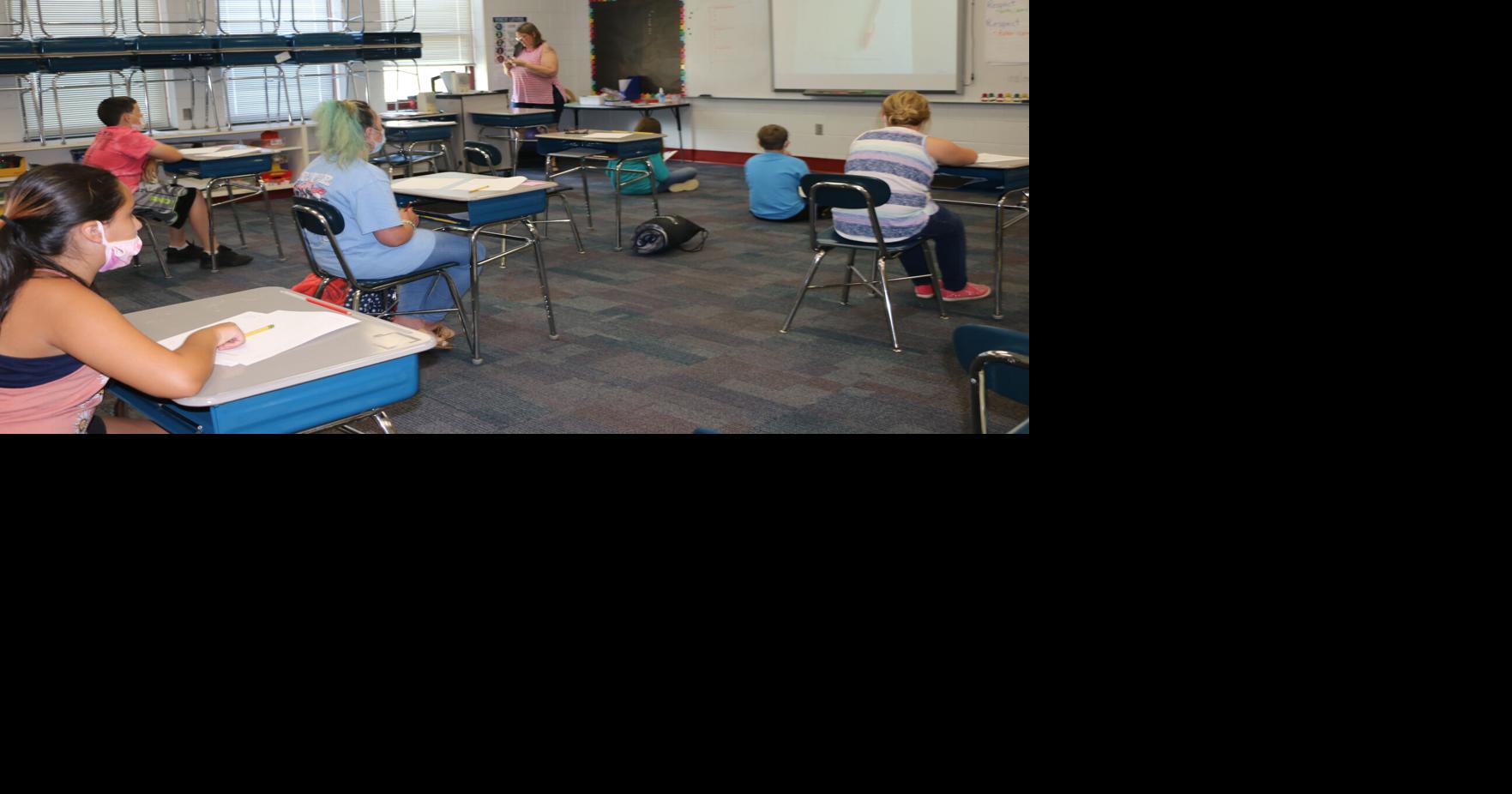 New school COVID policy means fewer missed days for students in ...