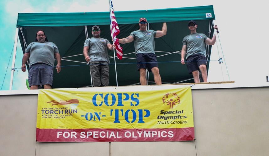 Cops on Top: officers and firefighters camp out on roof for a good ...