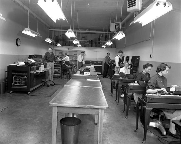 A glimpse inside Champion Paper and Fibre Company’s tabulating office ...