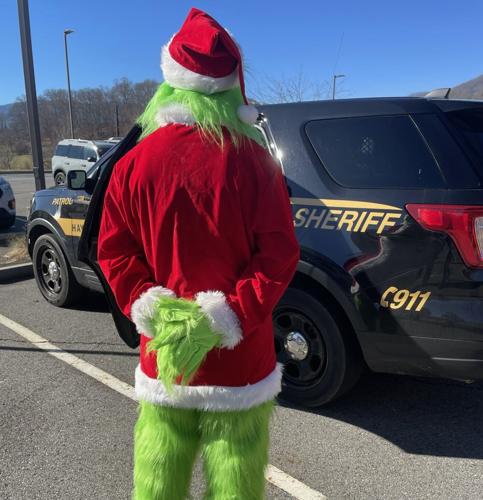 Caught green handed: Grinch cuffed and arrested at Bethel Elementary ...