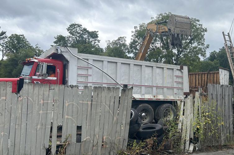 Sutton Automotive building demolished, but junk vehicles remain | News ...