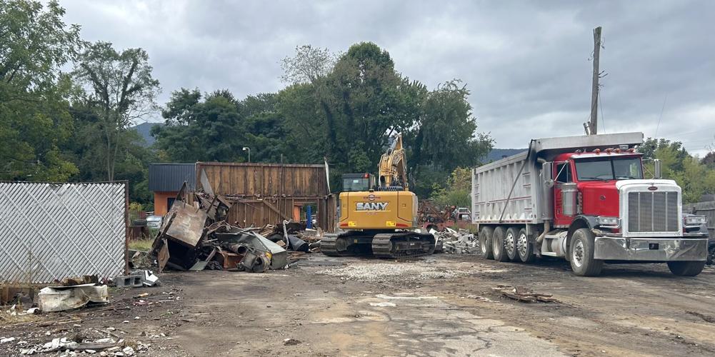 Sutton Automotive building demolished, but junk vehicles remain | News ...