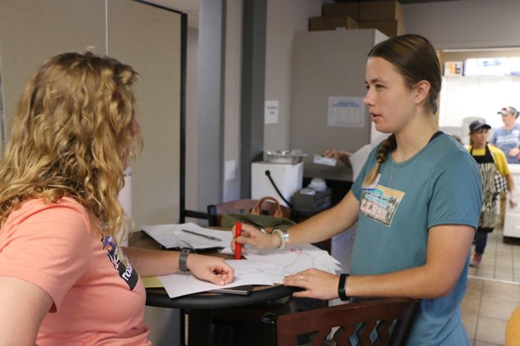 Hot meals to-go: New Covenant Church volunteers go door-to-door helping ...