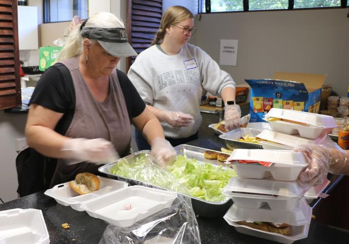 Hot meals to-go: New Covenant Church volunteers go door-to-door helping ...