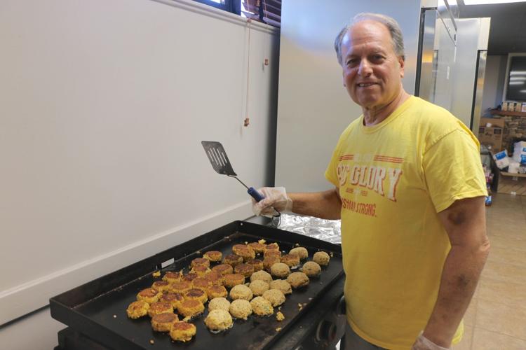 Hot meals to-go: New Covenant Church volunteers go door-to-door helping ...