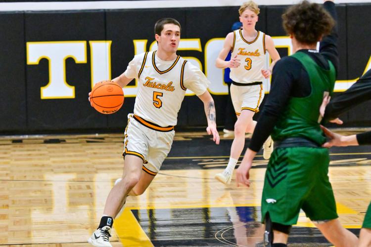 Tuscola boys basketball close out regular season with home loss ...