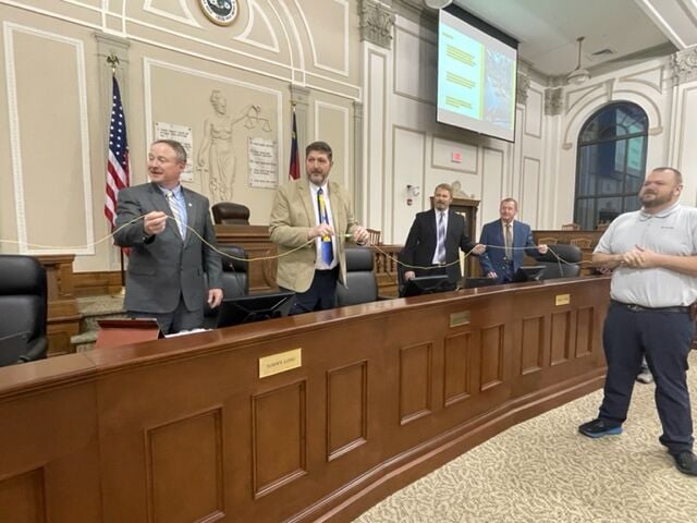 Connecting the cord: inverse ribbon-cutting celebrates rural broadband ...