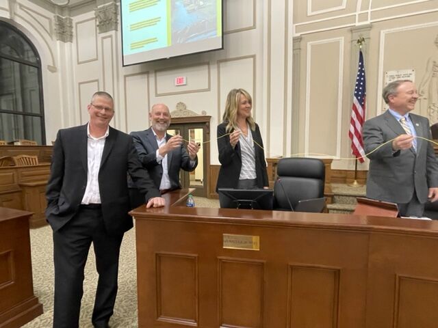 Connecting the cord: inverse ribbon-cutting celebrates rural broadband ...