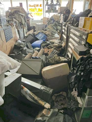 Old Grouch's military surplus store hanging on despite storm damage ...